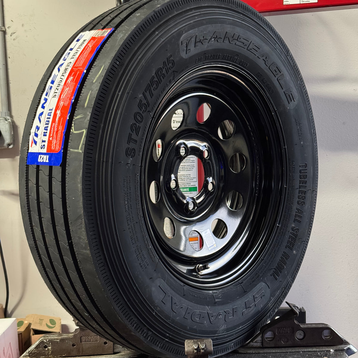 ST205/75R15 14-Ply Trailer Tire on 15" 5-4.5 Black Modular Wheel ...